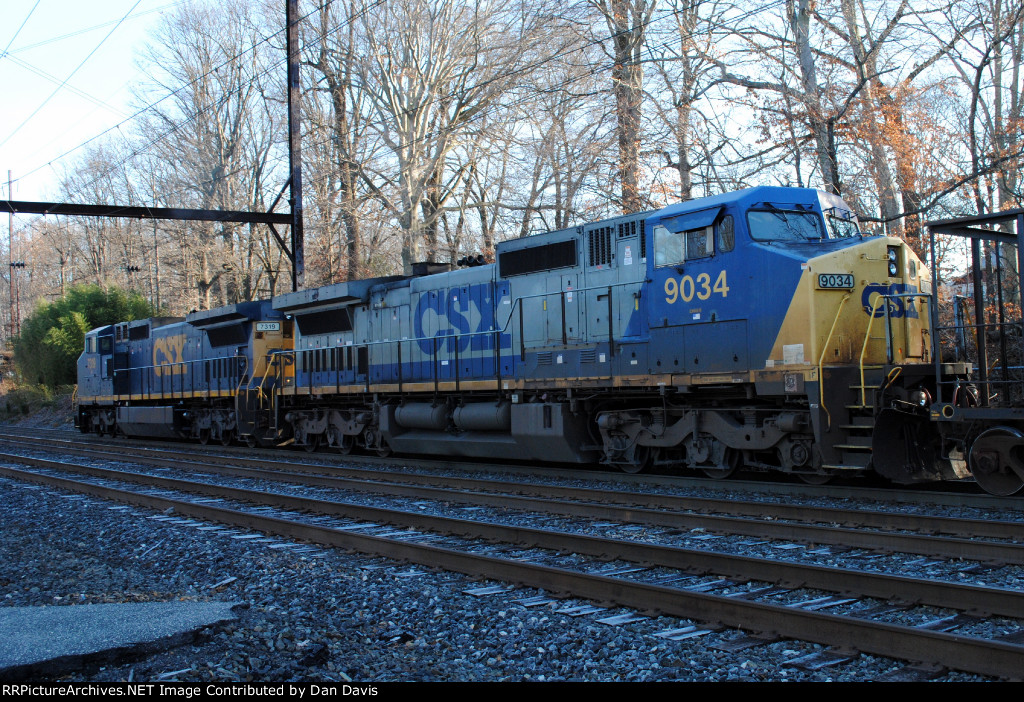 CSX CW40-9 9034 trails on Q300-03